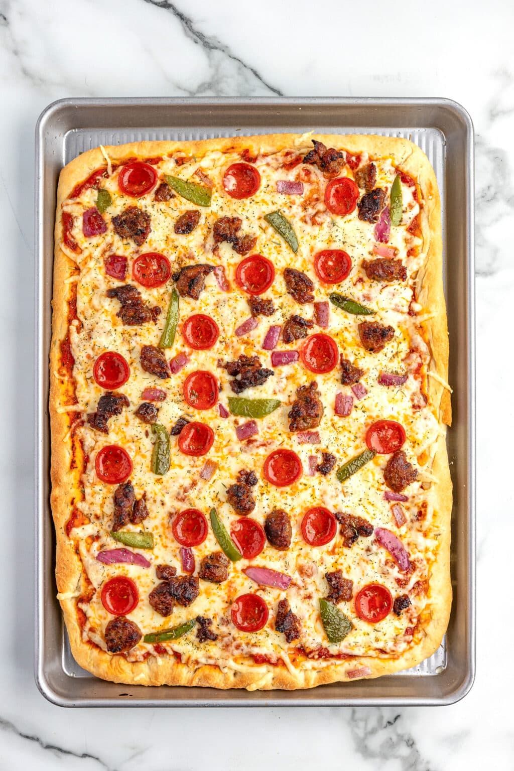 Sheet Pan Pizza -Thick, Chewy Crust with Crispy Edges - On My Kids Plate